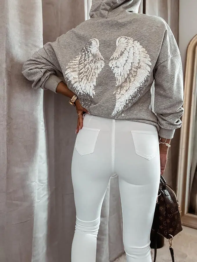 Biele roztrhané rifle s vysokým pásom | Starstyle.cz